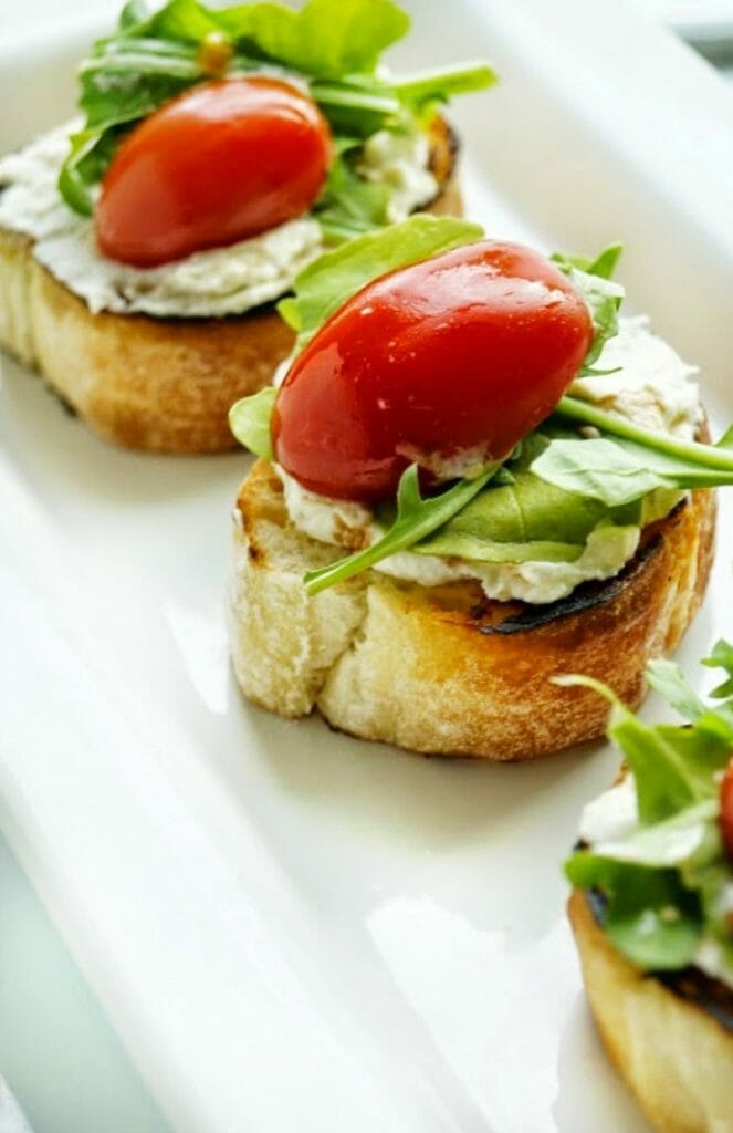 Herbed Ricotta Crostini with Marinated Tomatoes Recipe